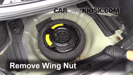 Fix a Flat Tire: Kia Rio (2001-2005) - 2004 Kia Rio 1.6L 4 Cyl.